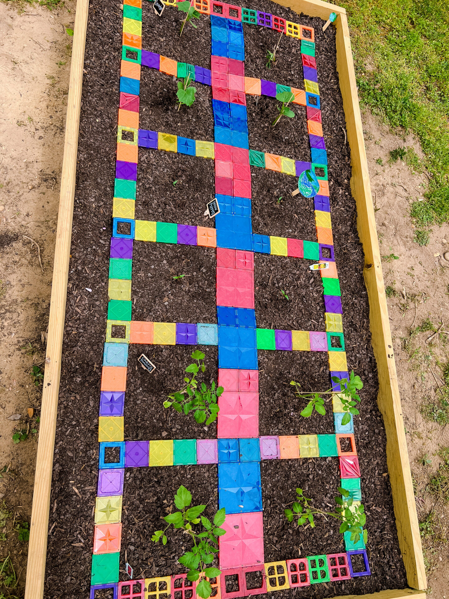 Parenting Hack Using Magna-Tiles In The Garden - Mason Jar of Memories